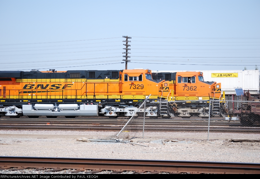 Two ES44DC's 7300 Series side by side built a year apart almost with BNSF 7329 the older model ...